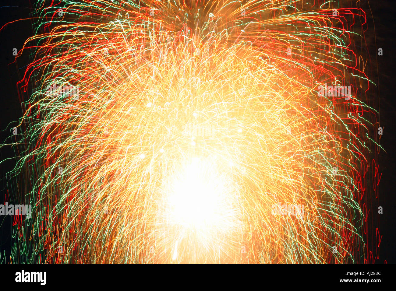 Orange and yellow fireworks Stock Photo - Alamy