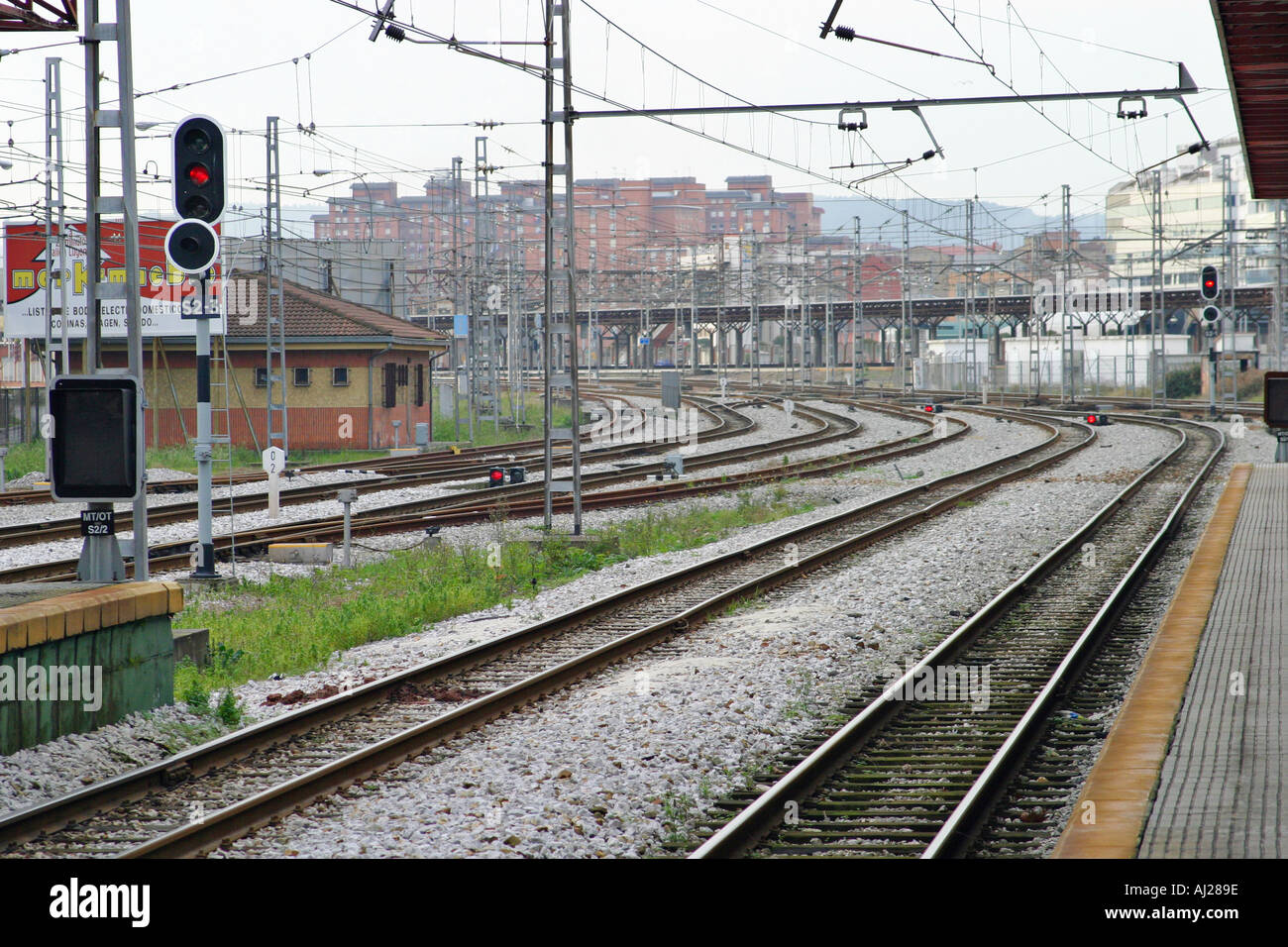 Lonely train station or depot with railway stretching away Stock Photo ...