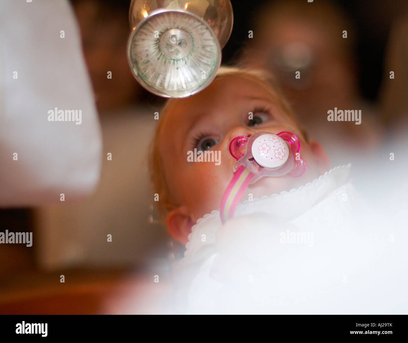 Child baptism holy water hi-res stock photography and images - Alamy