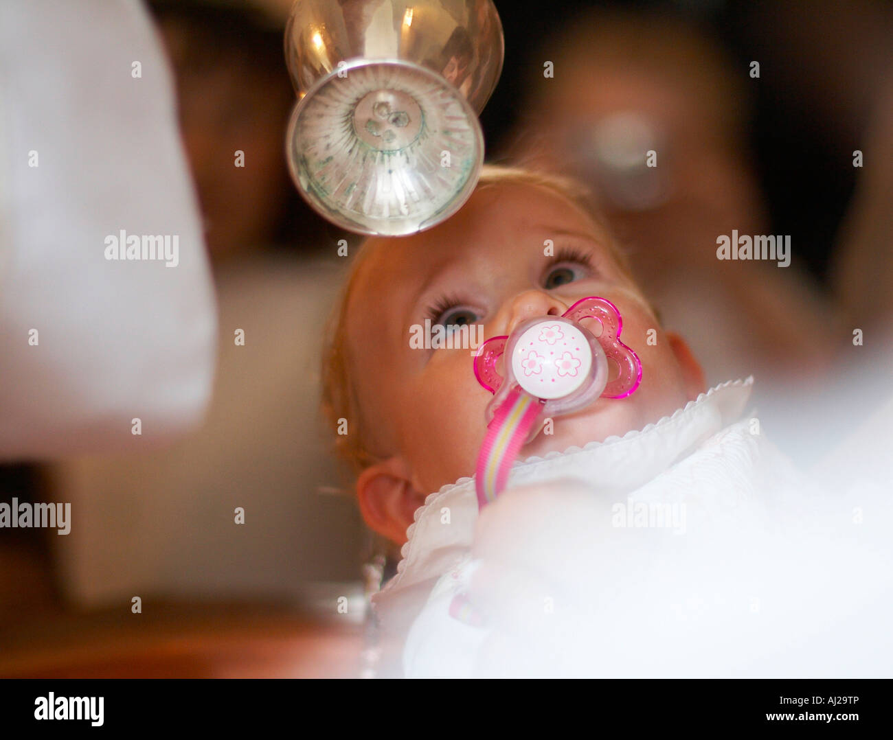 baptism of a little girl Stock Photo - Alamy