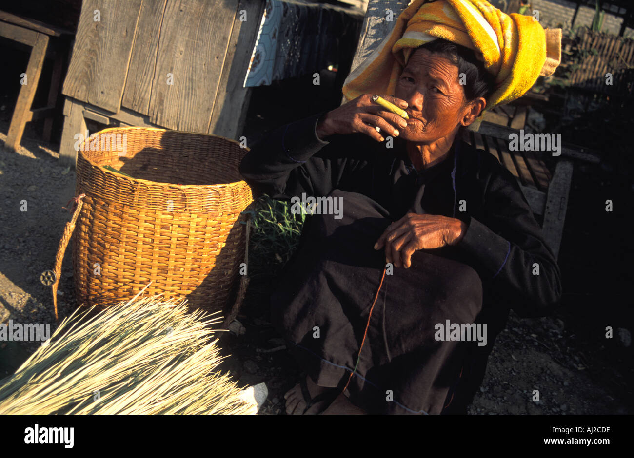 Old Burmese Lady Smoking a Cigar Stock Photo - Alamy