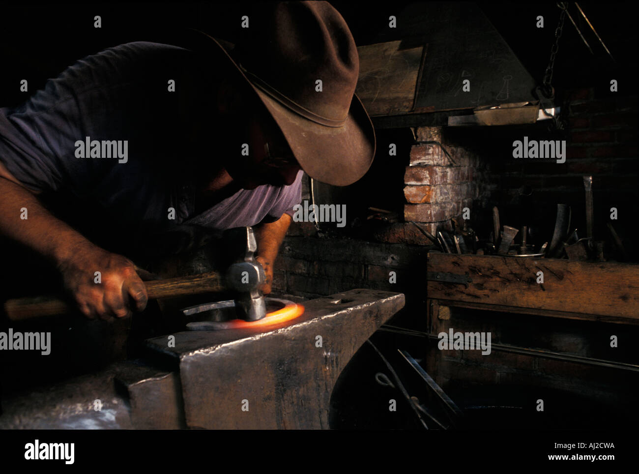 Canada British Columbia MR Michael McGuinness hammers hot steel at ...