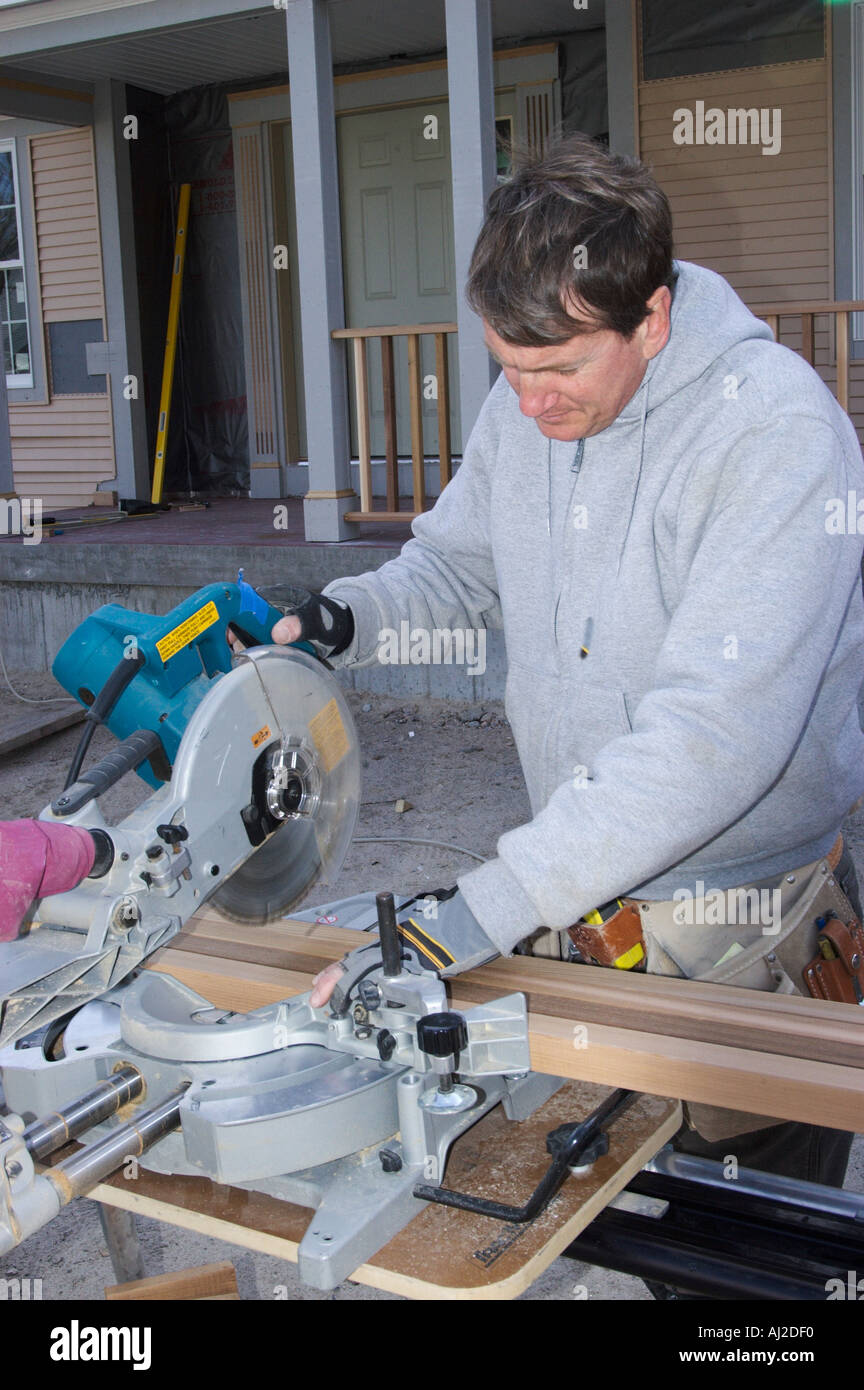 Carpenter using radial saw Stock Photo - Alamy