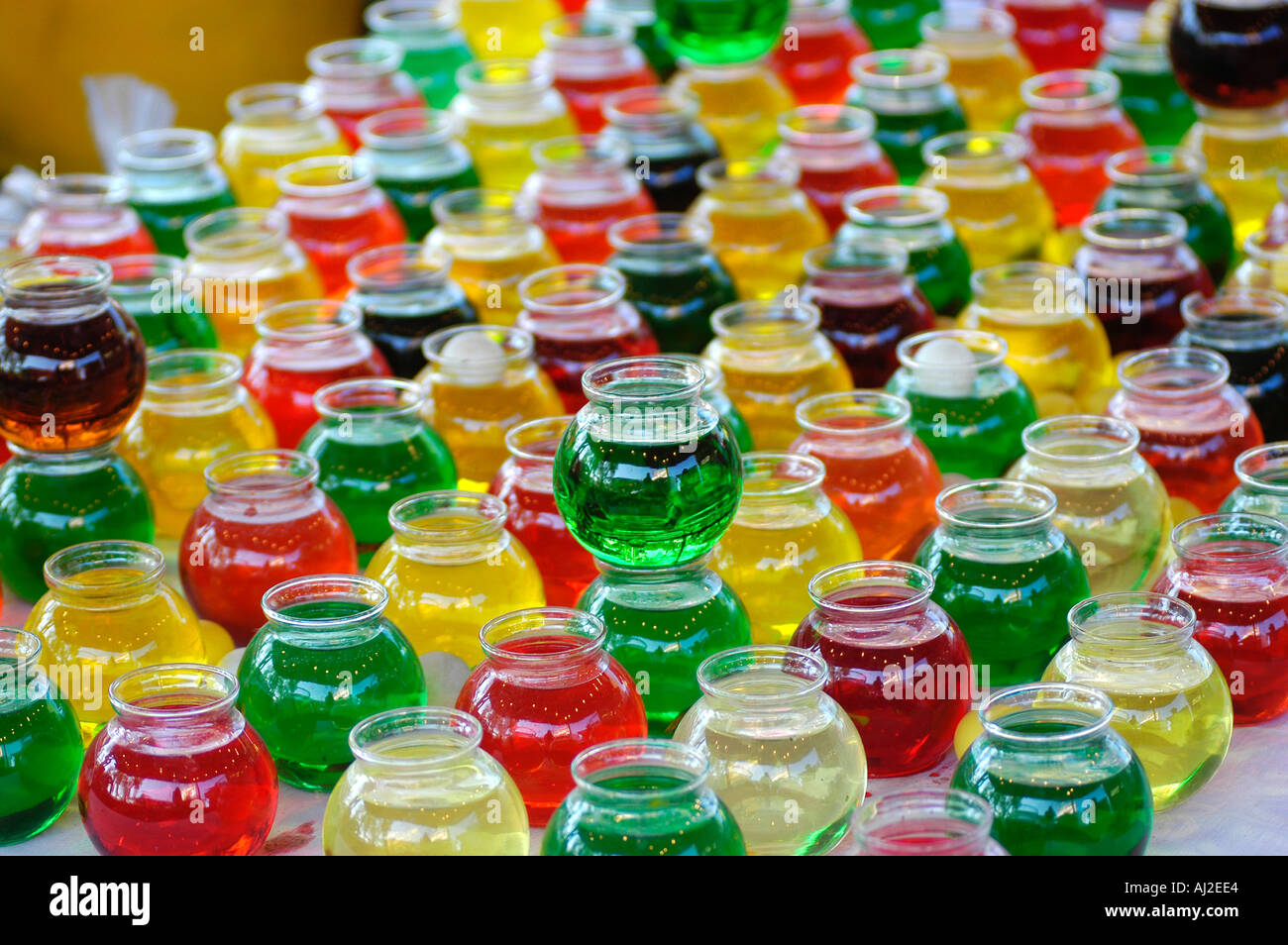 Pattern of Colorful Fish Bowls on the Ground Stock Photo - Alamy
