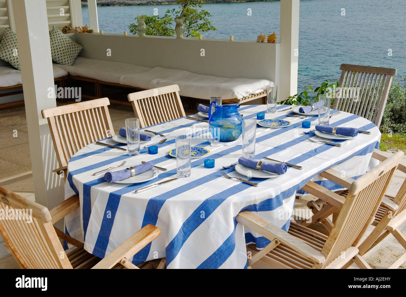 Table laid for lunch by the swimming pool at Little Whale Cay Stock ...