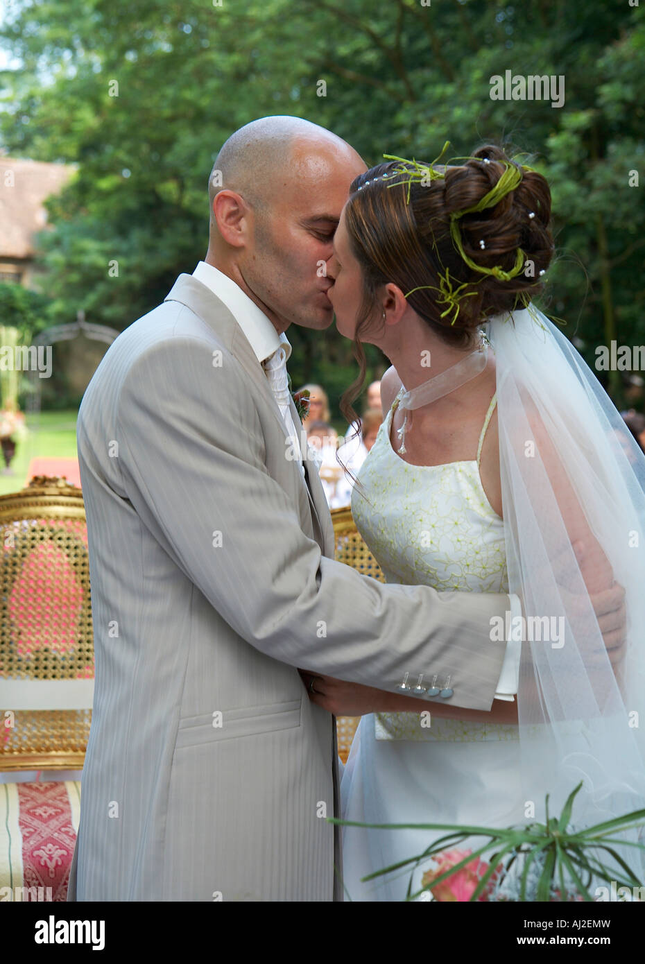 bridal couple kissing Stock Photo - Alamy