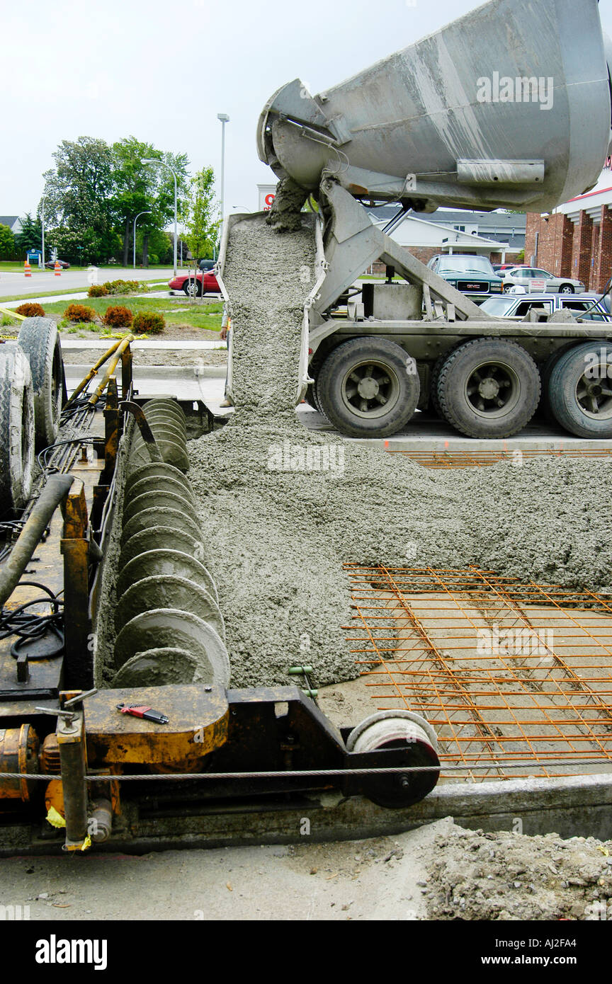 Workers Pour Cement in New Highway Construction Stock Photo - Alamy