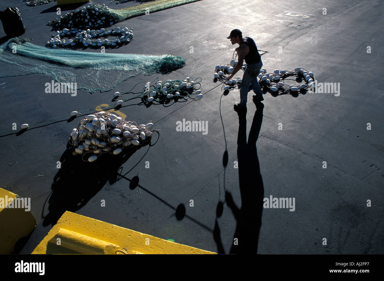USA Washington Seattle MR John Gaines coils cork line from salmon ...