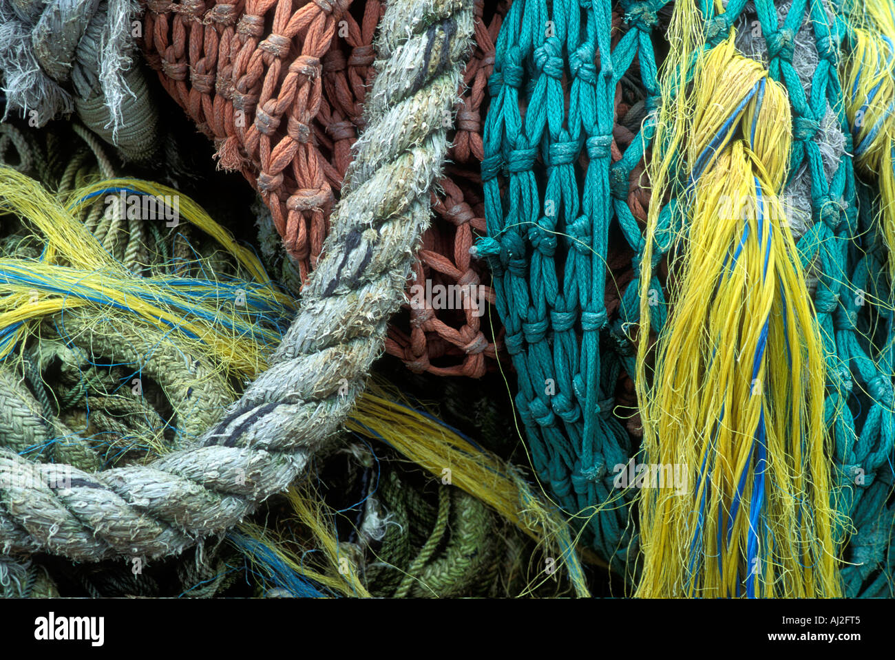 USA Alaska Brightly colored fishing nets line boat harbor in early ...