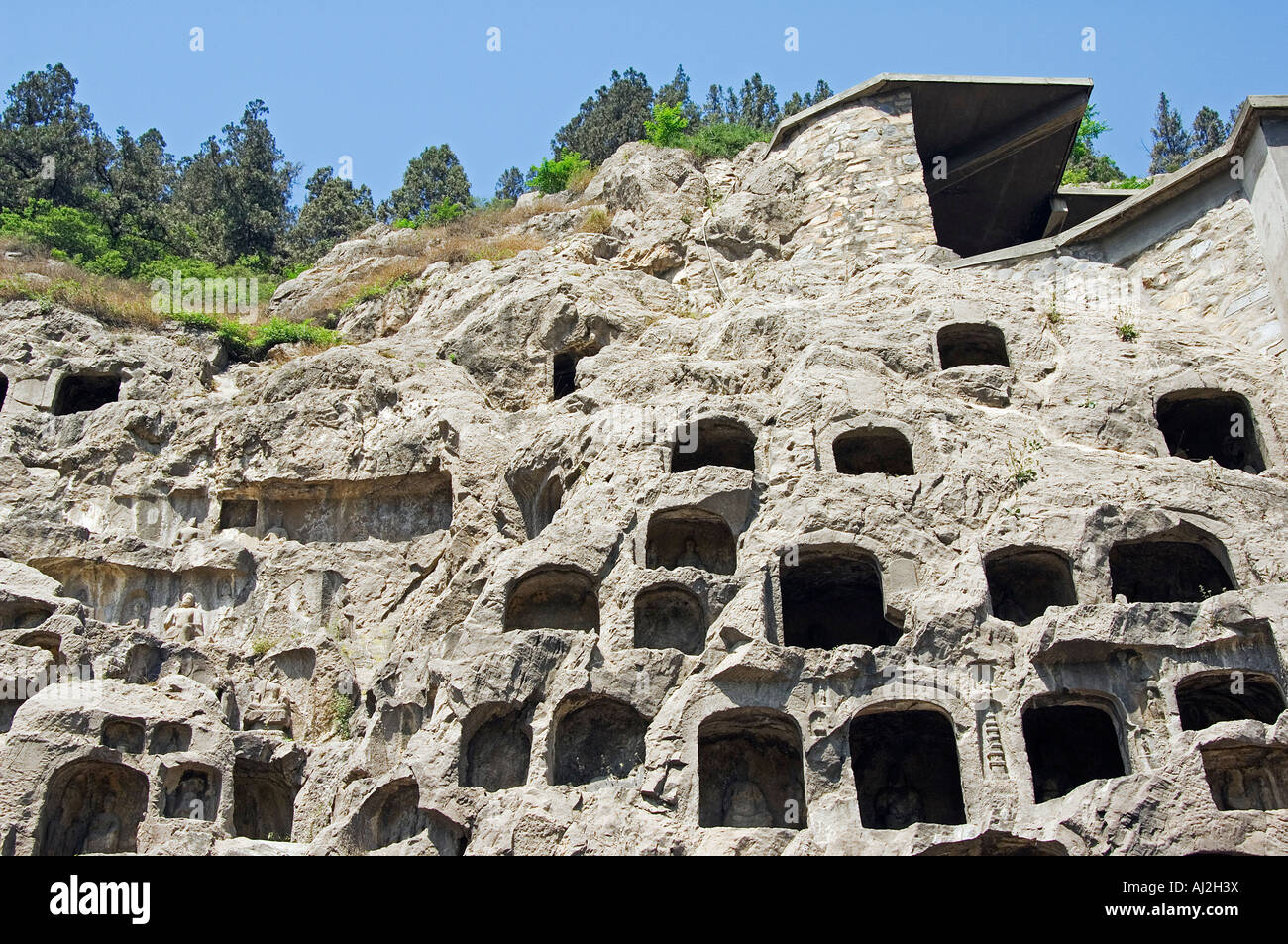 Longmen Caves, Dragon Gate Grottoes on the Yi He River, Henan Province ...