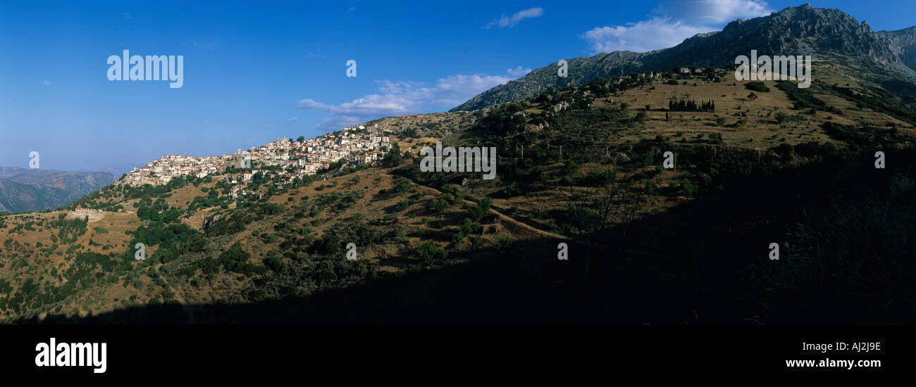 Europe Greece Sterea Ellada Arahova Morning sun lights village on ...