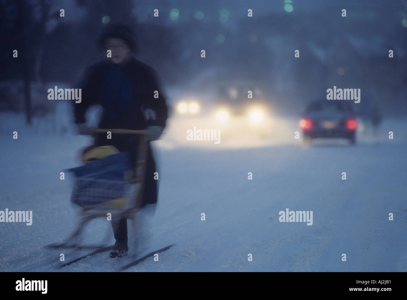 Norway Women push snow carts through the streets of the Arctic town of ...