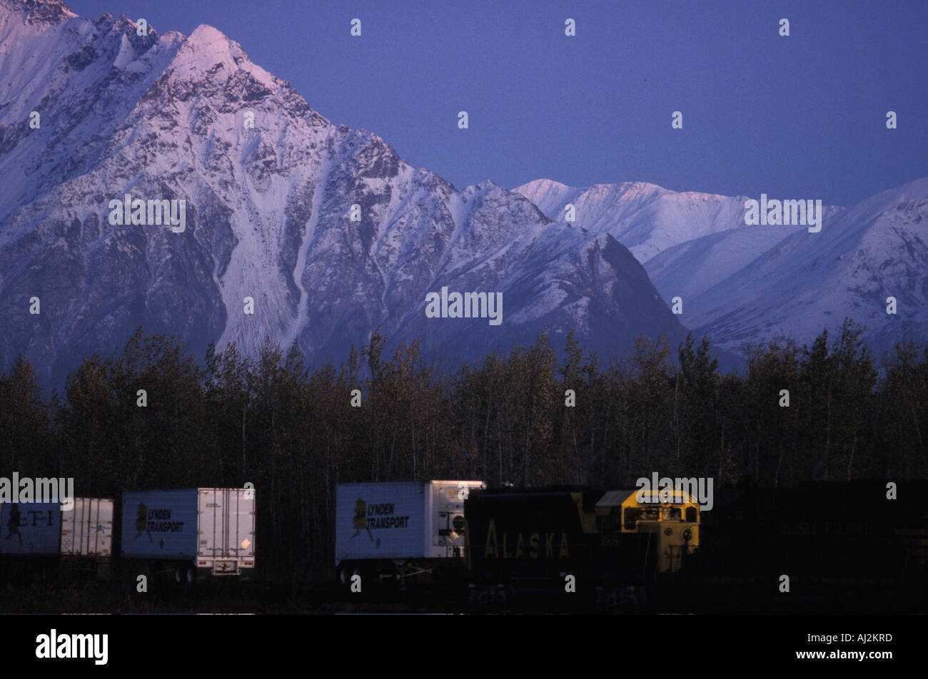 USA Alaska Alaska Railroad train runs past Pioneer Peak in Matanuska ...