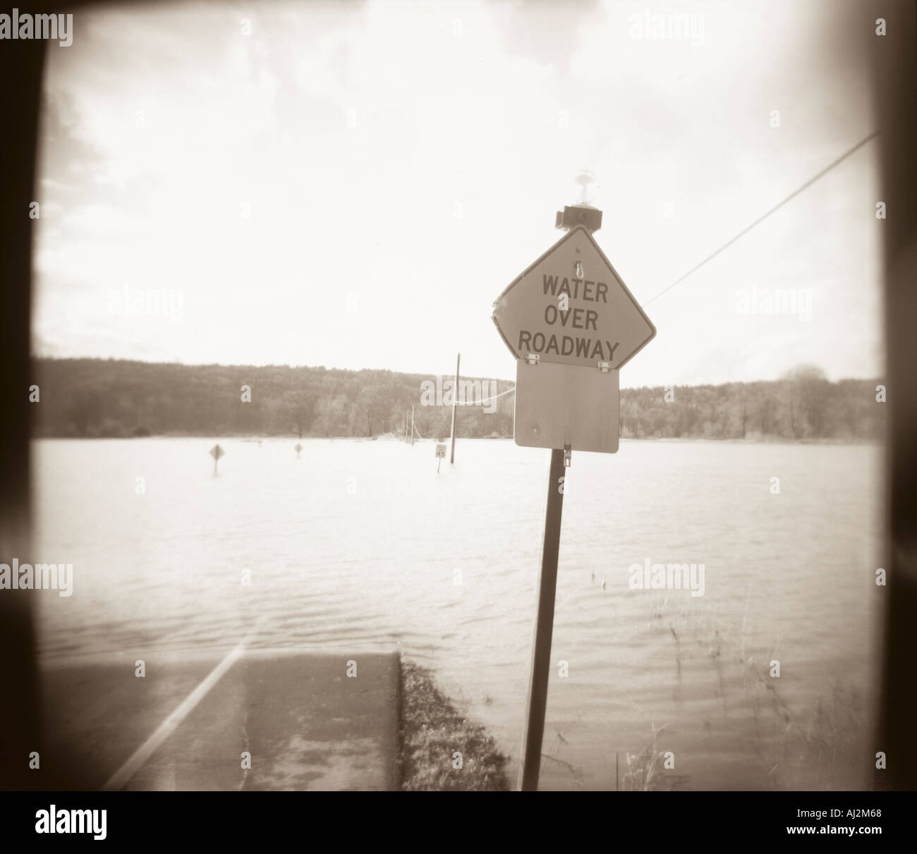 USA Washington North Bend Warning sign on country road blocked by flood ...