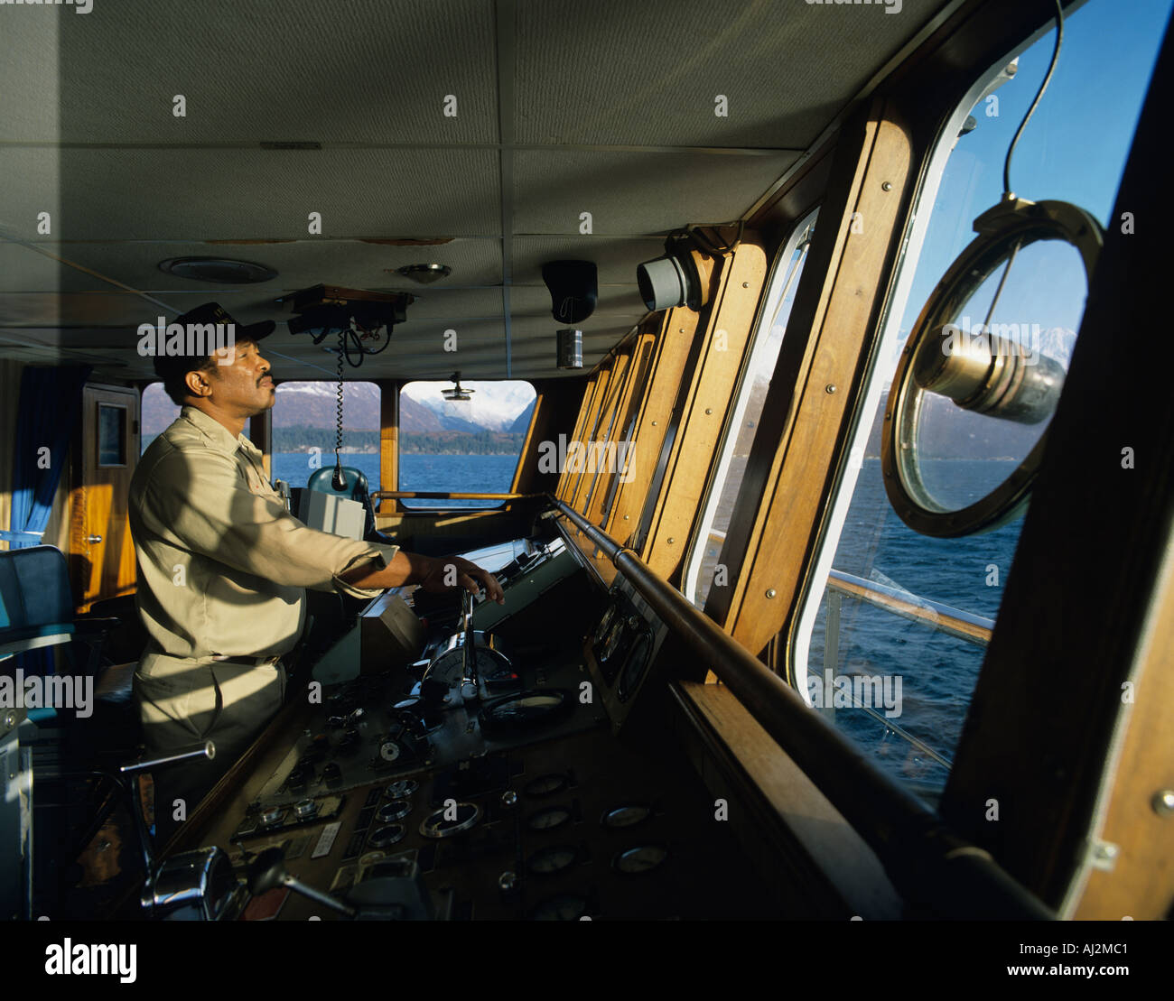 USA Alaska Captain Gus Taylor pilots tugboat M V Heritage Service ...