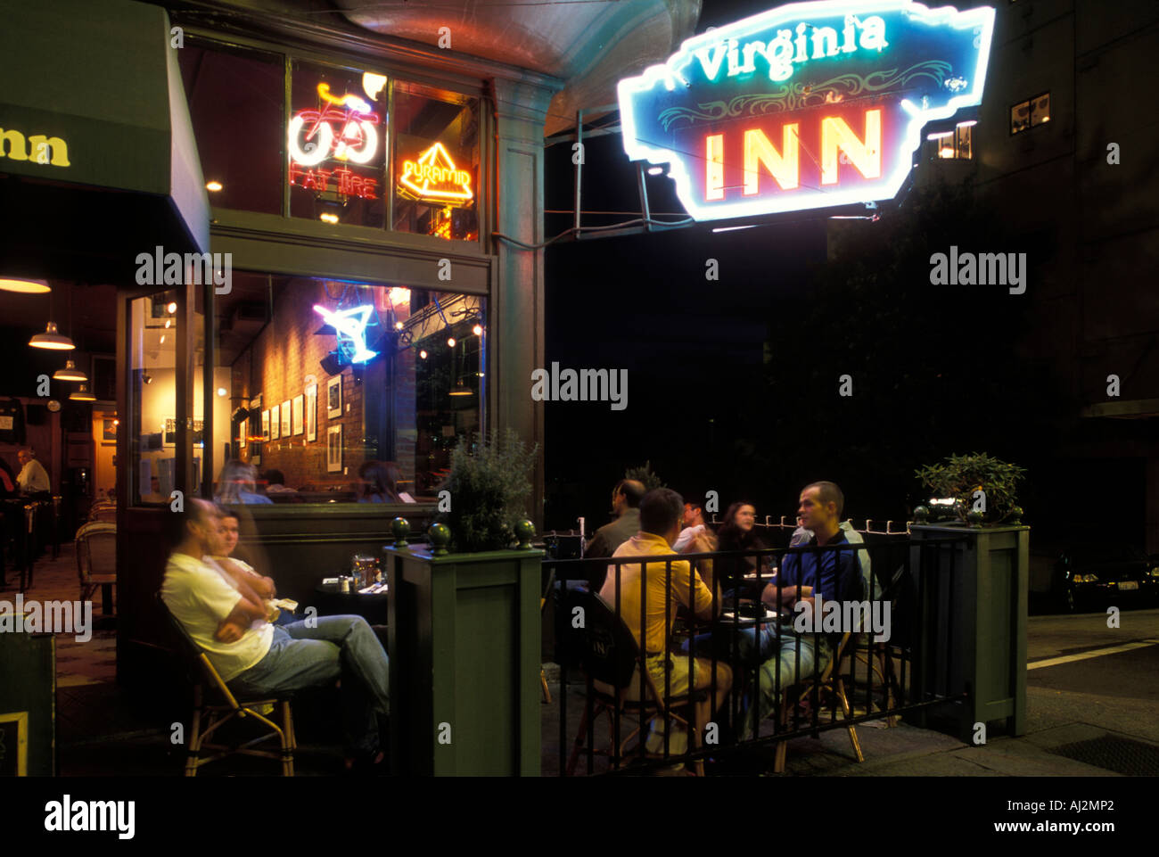 USA Washington Seattle Restaurant patrons sit outside the Virginia Inn ...