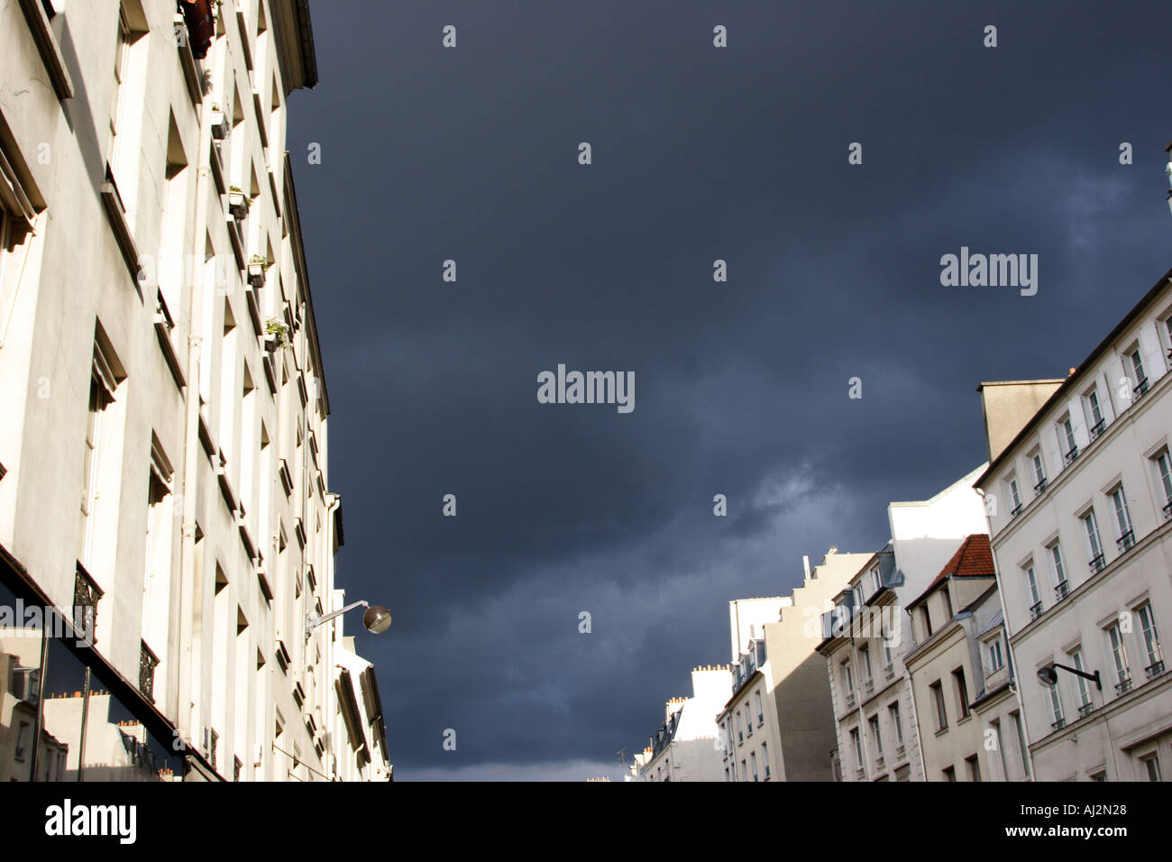Paris France Summer stormy sky above the city typical architecture in ...