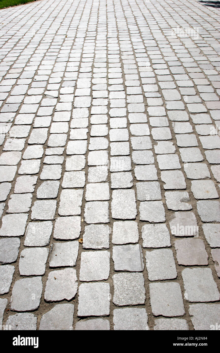 Paris France Original street pavement in stone bricks Stock Photo - Alamy
