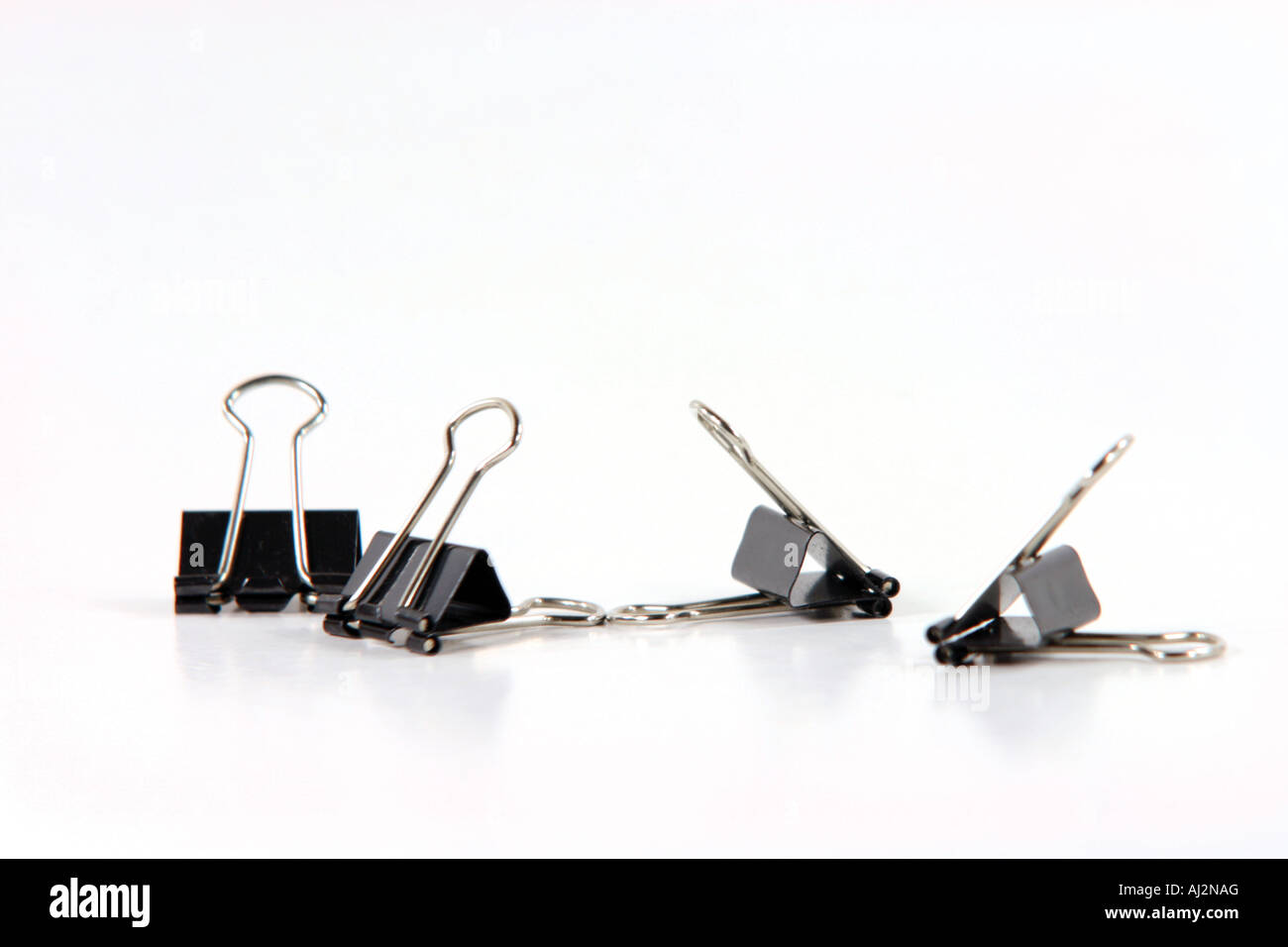 paper binders in white background office stationary Stock Photo - Alamy