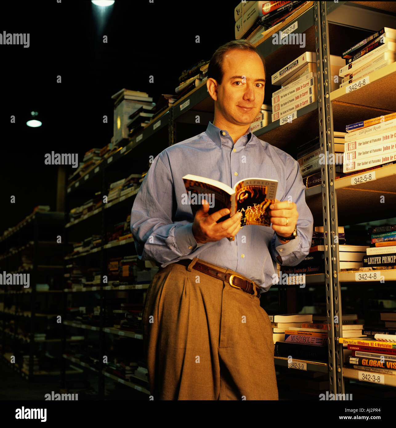 USA Washington Amazon com President Jeff Bezos with stacks of books ...