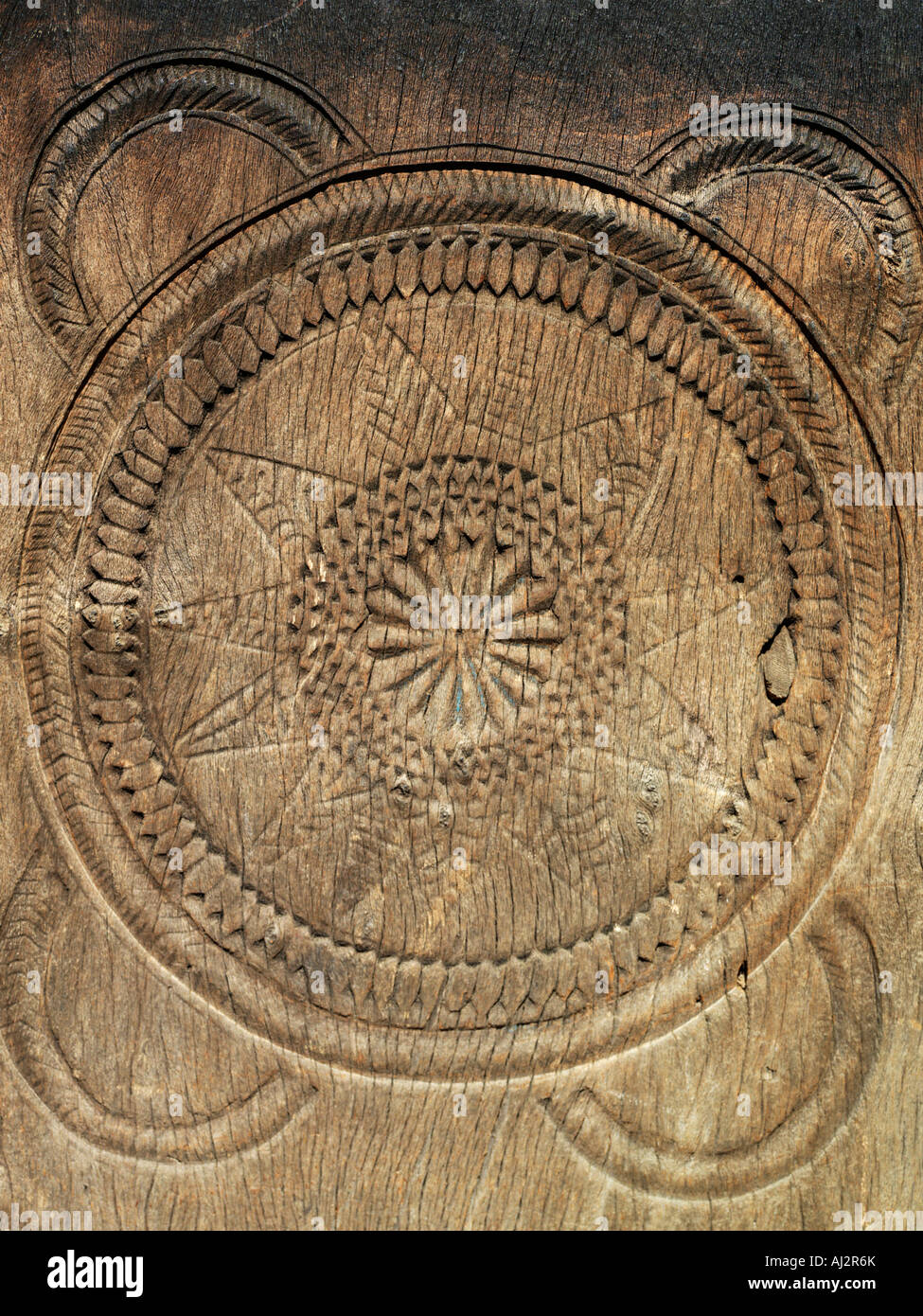 A typical carved shutter of a Zafimaniry house at Ifasina. The carving ...