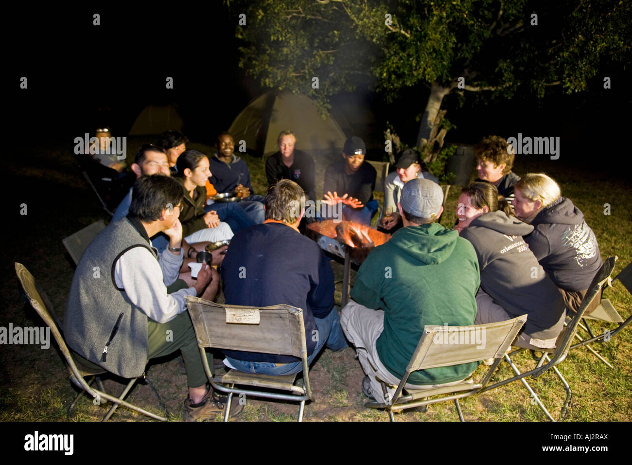 Huddle around the fire hi-res stock photography and images - Alamy