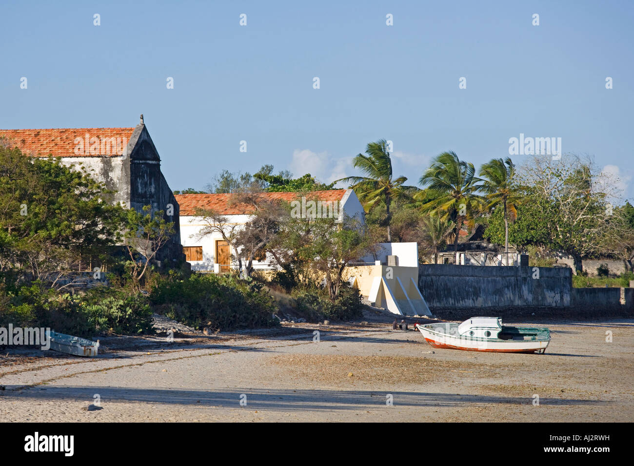 Portuguese colonial buildings line the harbour of Ibo Island, part of ...