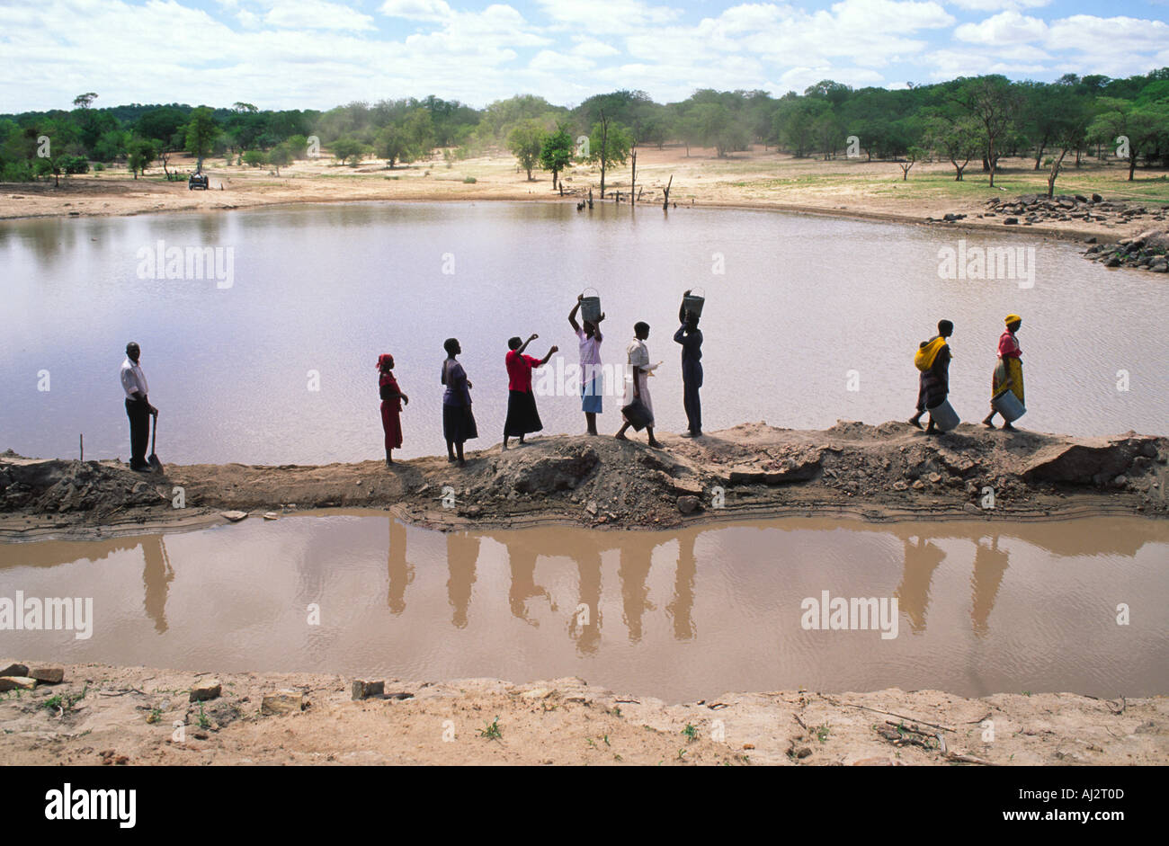 Locals on a Community dam-building project to conserve water, near ...