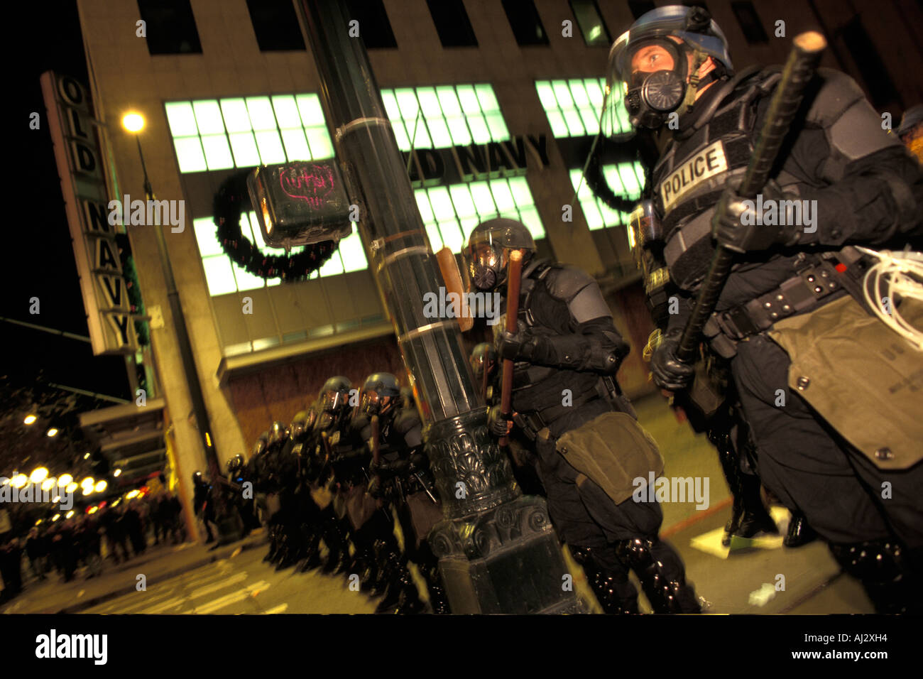 USA Washington Seattle Line of police in riot gear face off against WTO ...