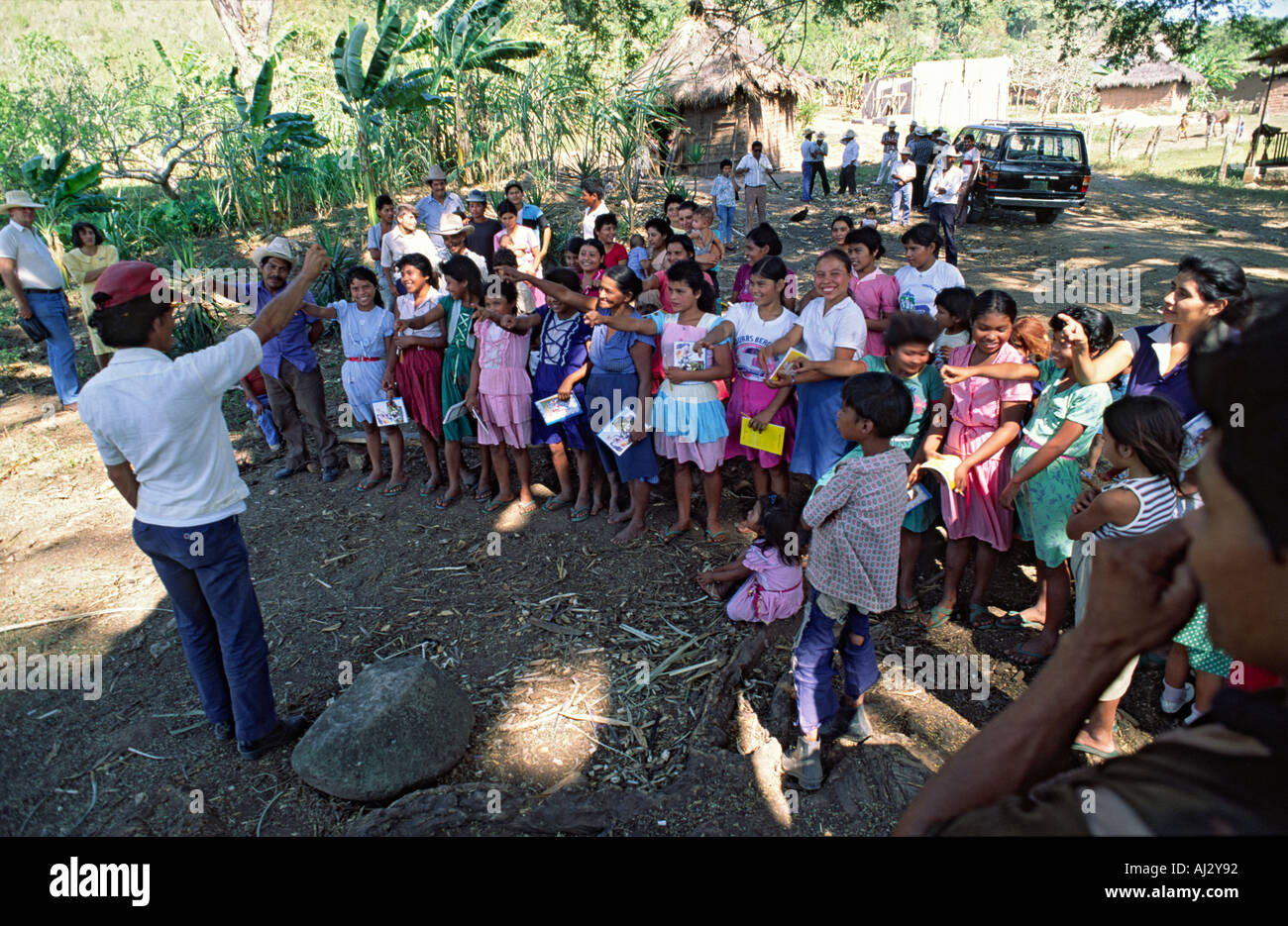 Women from a village community signing up for literacy classes ...