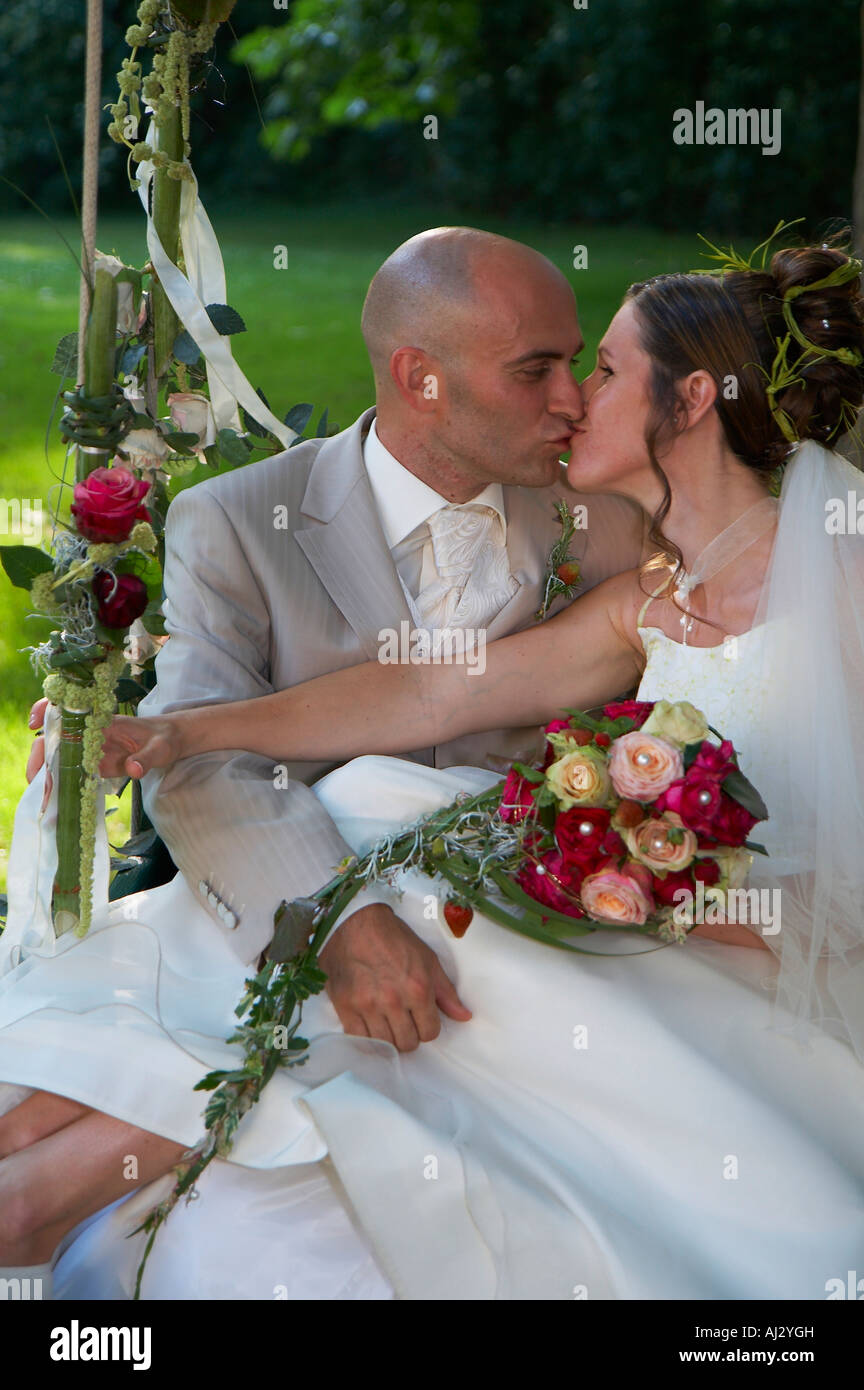bridal couple kissing Stock Photo - Alamy