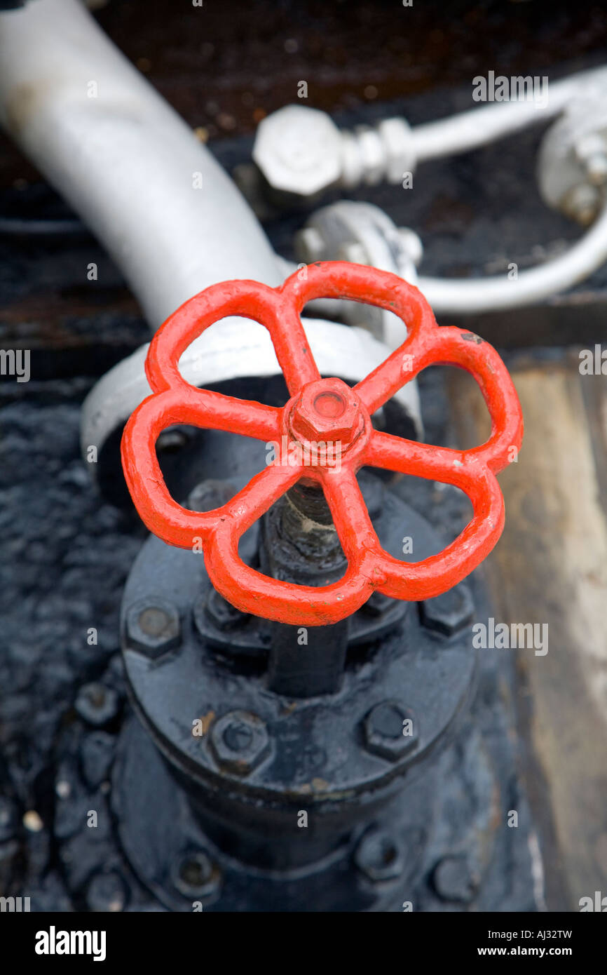 red tap handle for steam valve Stock Photo - Alamy