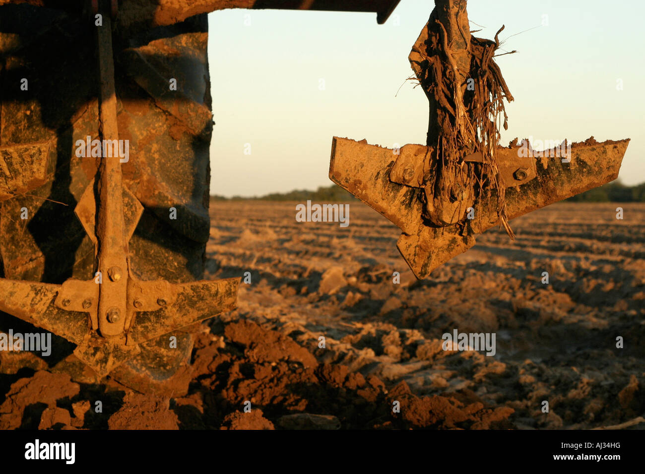 A farming implement close up cultivator tine Stock Photo - Alamy
