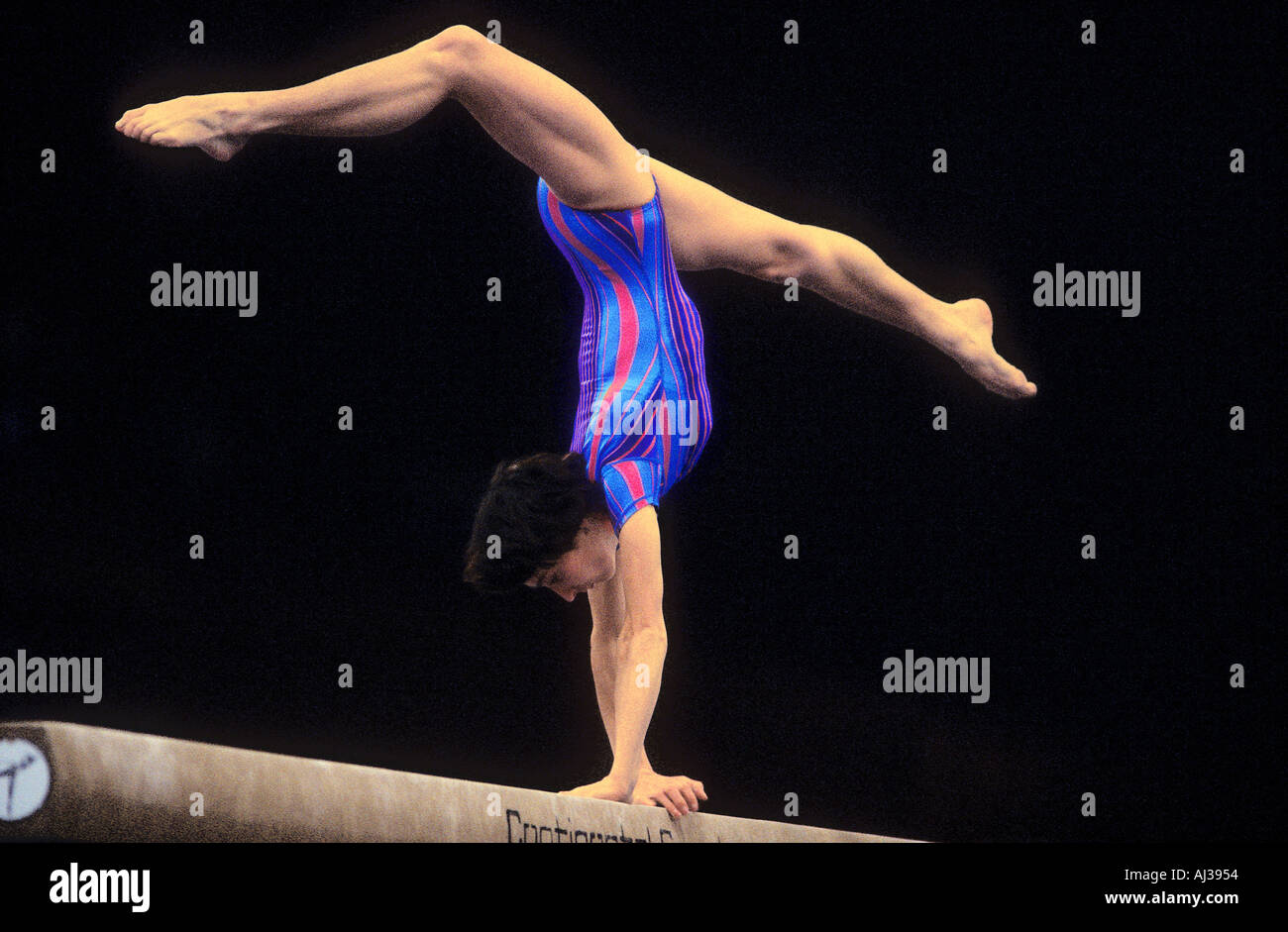 Russian gymnast balancing on the Beam Stock Photo - Alamy