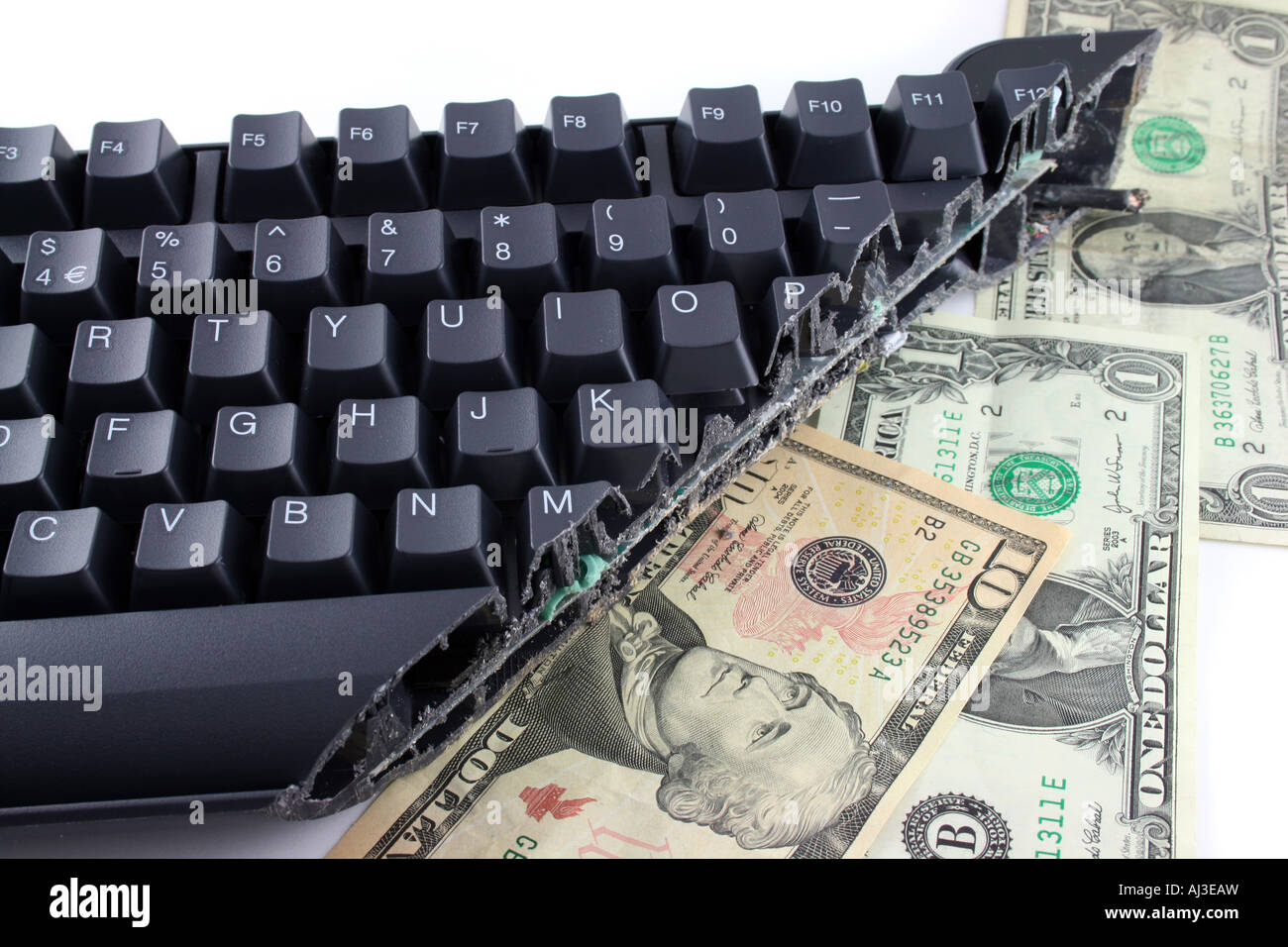 Modern keyboard cut completely in half showing keys and wires still in ...