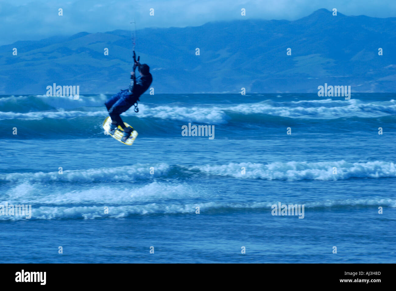 Happy boy jumping in waves hi-res stock photography and images - Alamy