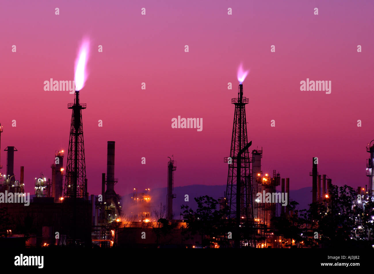 Oil Refinery Sunset Stock Photo - Alamy