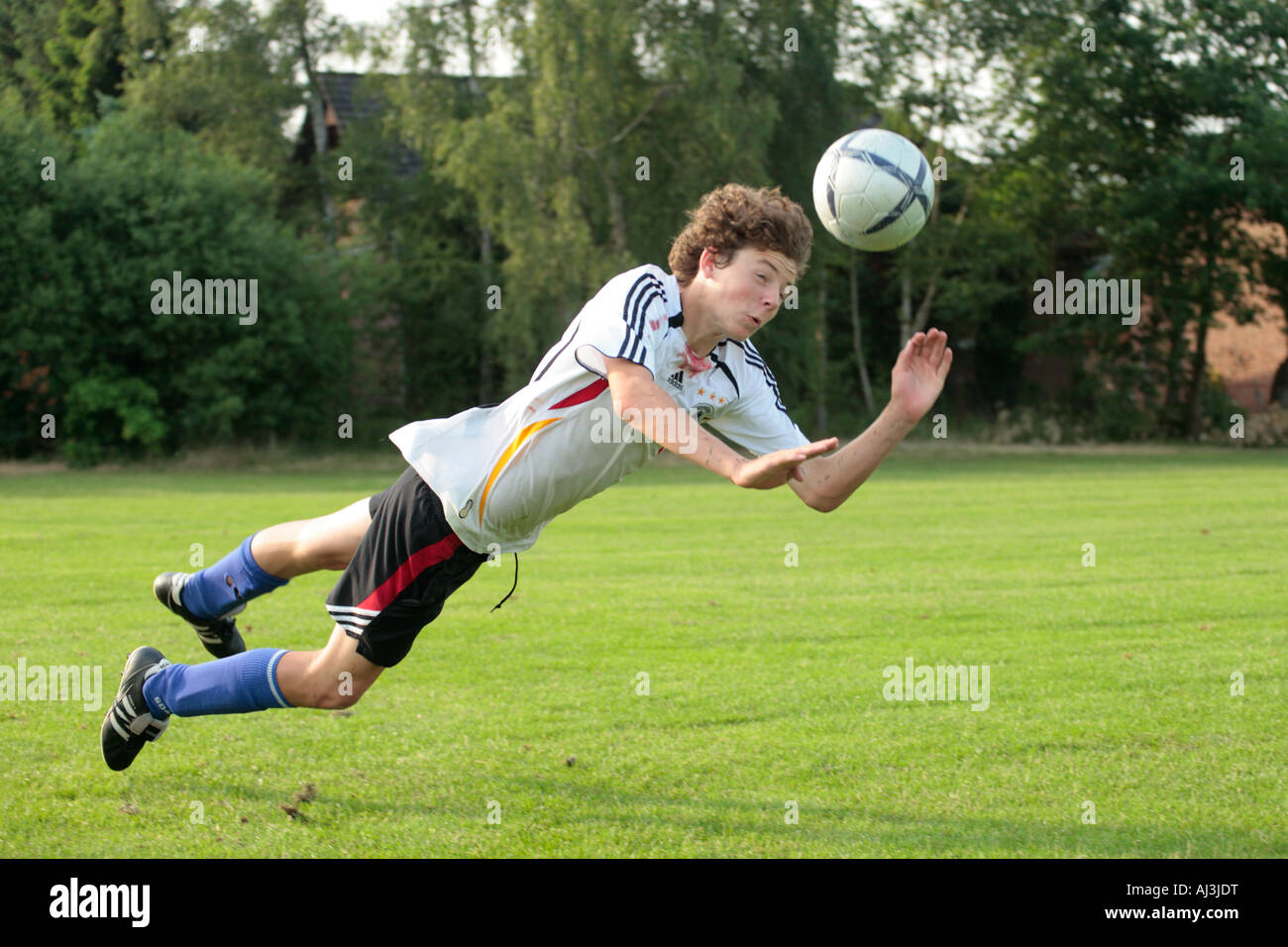 Kid Football Header Stock Photos & Kid Football Header Stock Images - Alamy