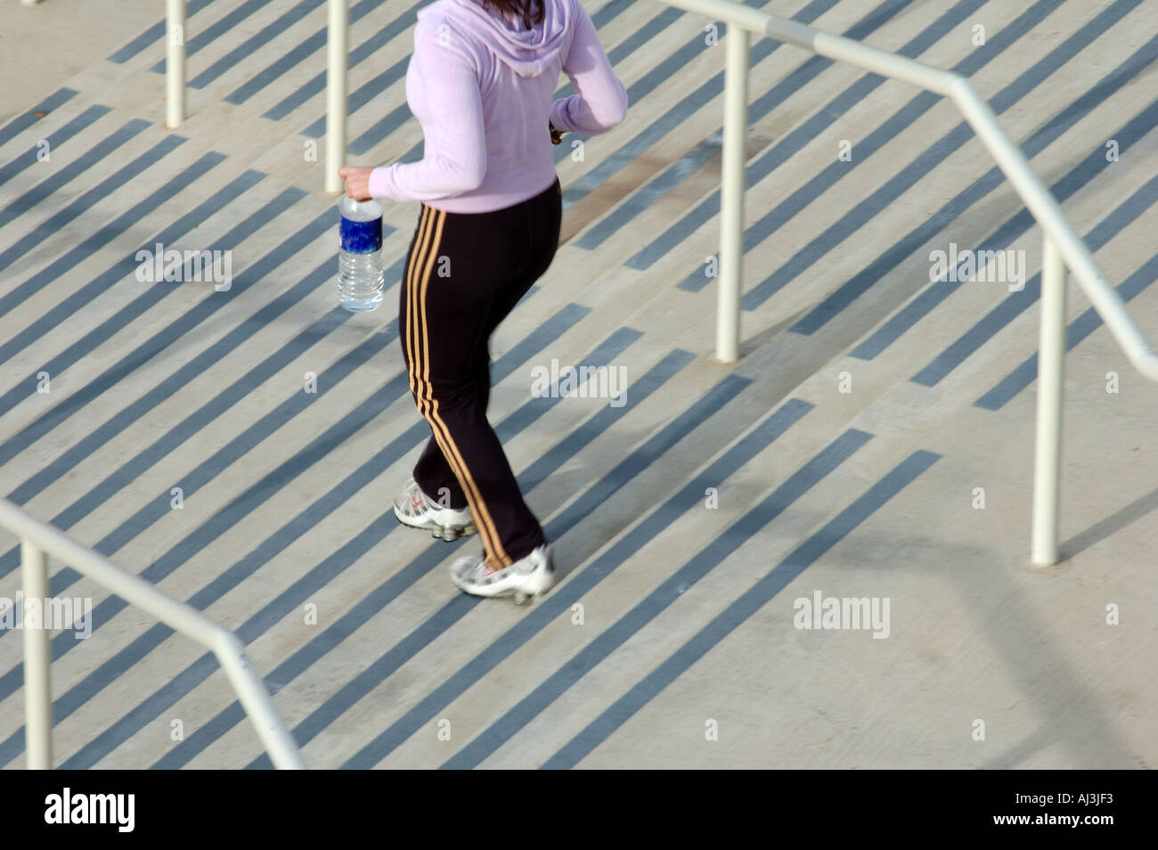 Woman walking stairs exercise hi-res stock photography and images - Alamy