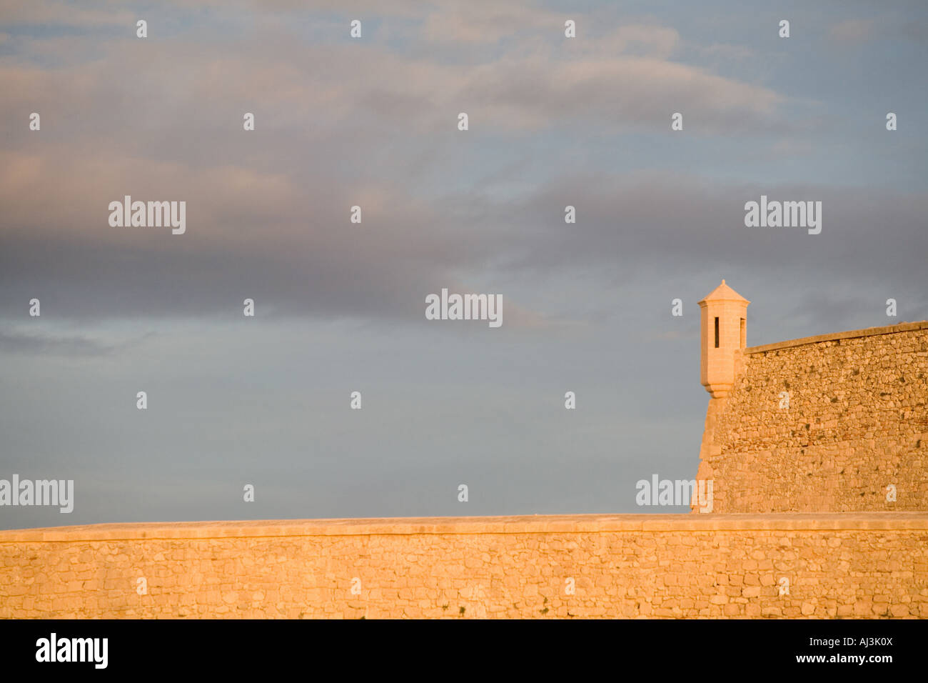 Fortified wall with turret Stock Photo - Alamy