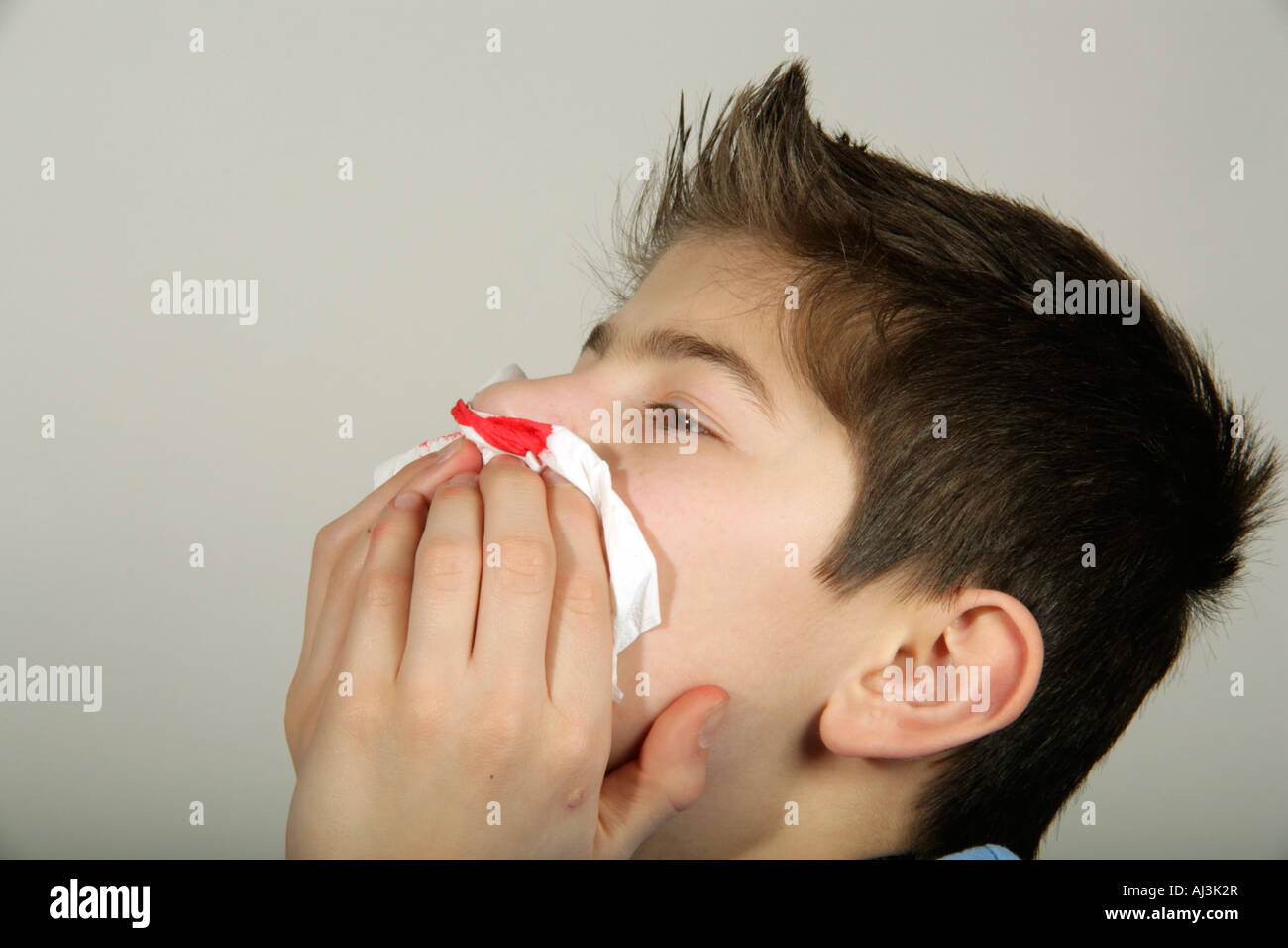 portrait of a young boy with a nosebleed Stock Photo - Alamy