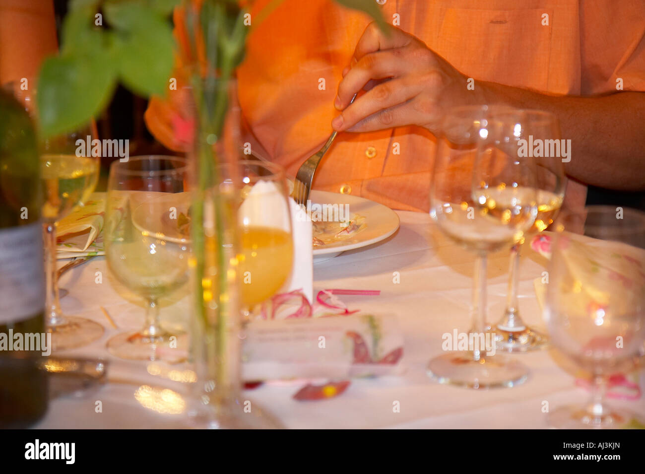 at the table Stock Photo - Alamy
