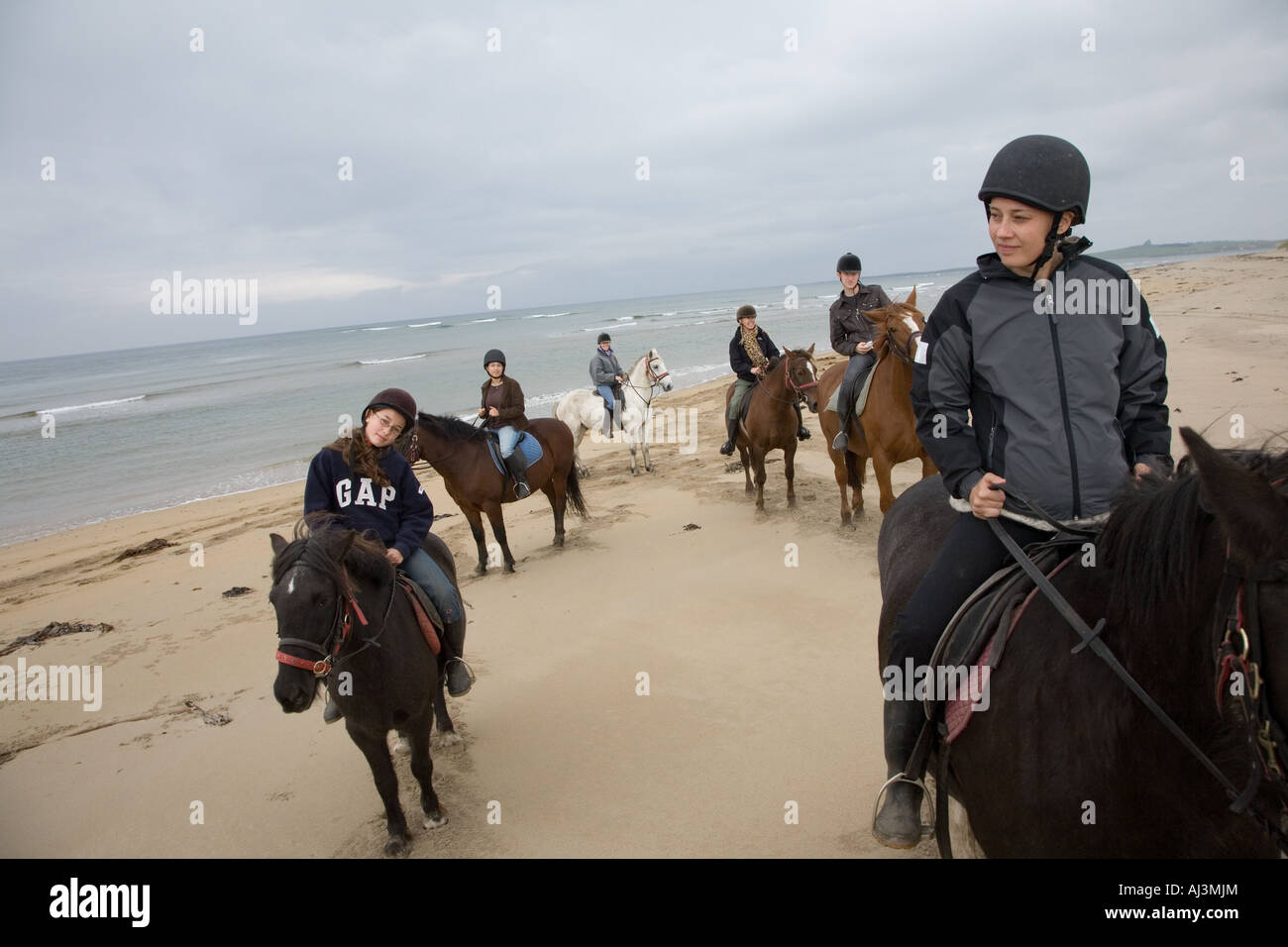 Stock photo of group of horseback riders on an Atlantic Ocean beach ...