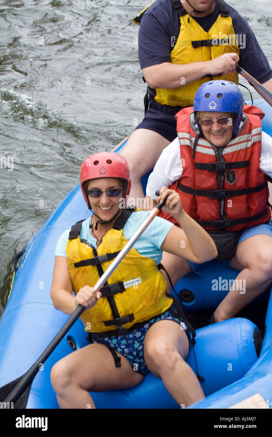 Paddling down river in inflatable canoe Stock Photo - Alamy