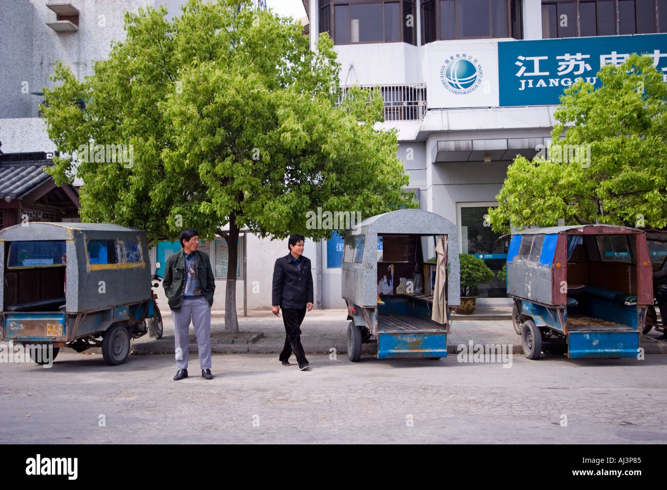 Drivers await a job assignment for their delivery vans Stock Photo - Alamy