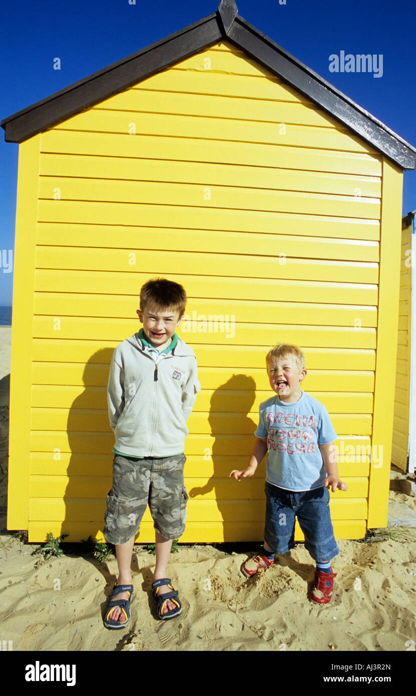 Boys Near Beach Hut At Southwold,Suffolk,uk Stock Photo - Alamy