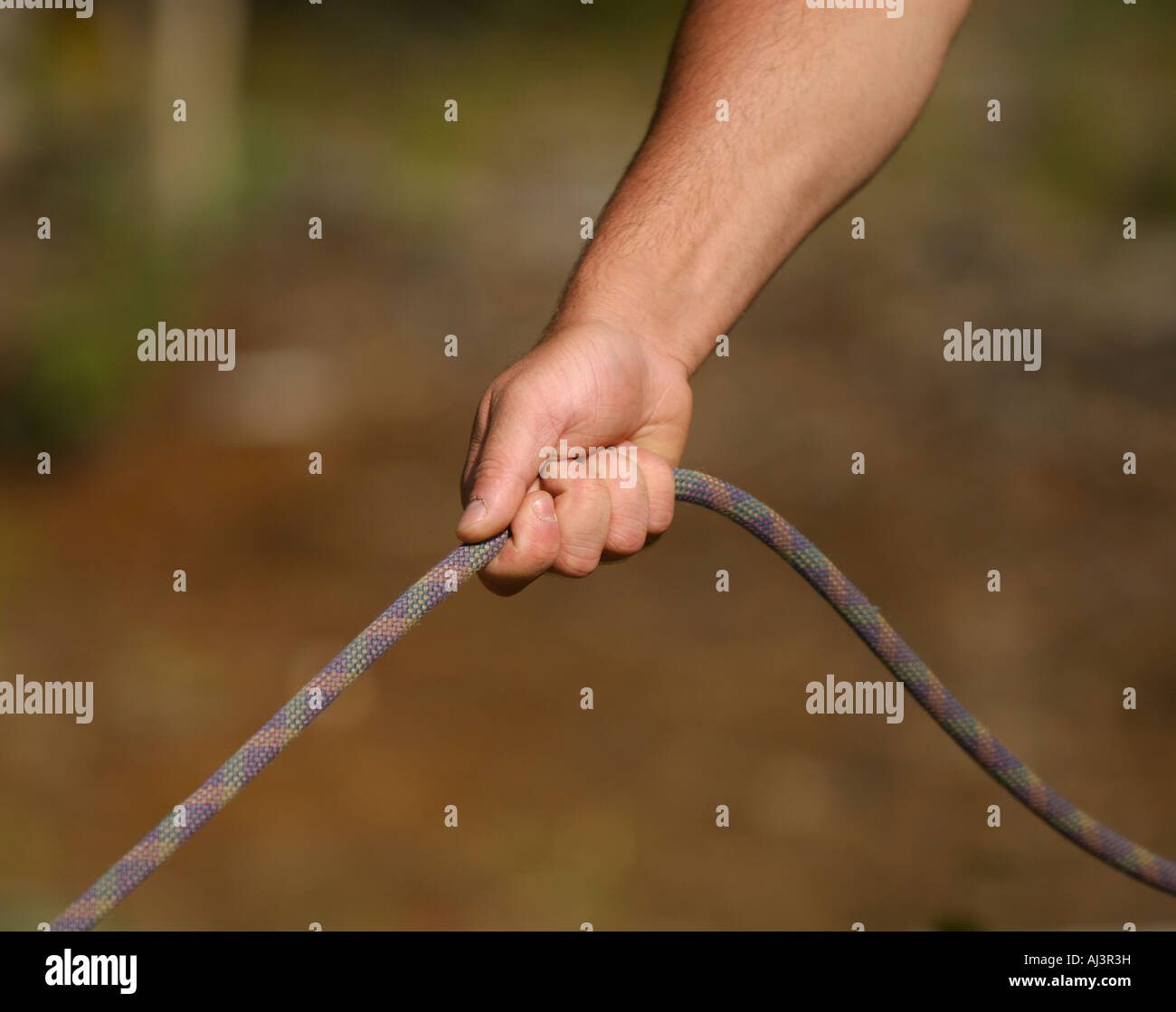 Hand pulling a rope hi-res stock photography and images - Alamy