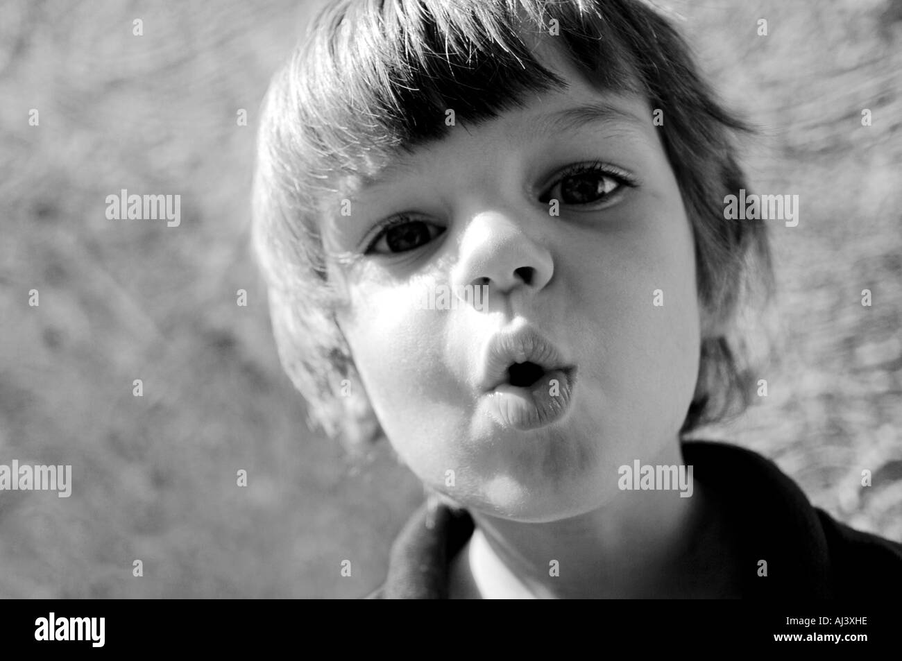 Child looking into the camera Stock Photo - Alamy