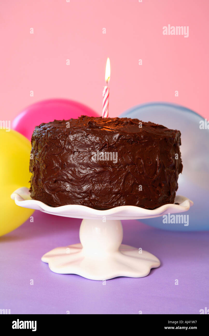 Chocolate Birthday Cake with single candle Stock Photo - Alamy
