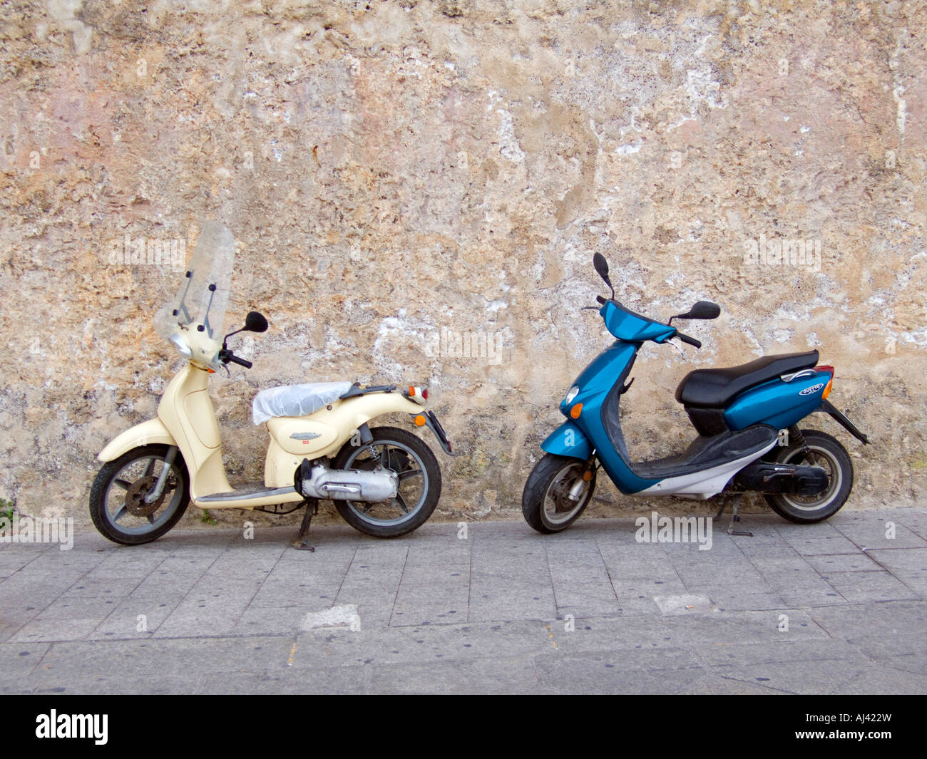 two scooters in the old town Stock Photo - Alamy